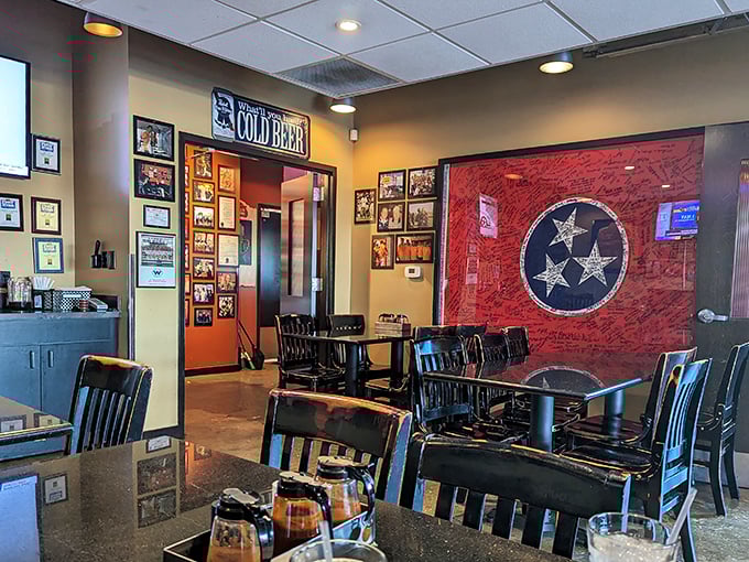 Tennessee's tristar emblem watches over diners like a patriotic guardian angel. Even the walls celebrate state pride and barbecue tradition.