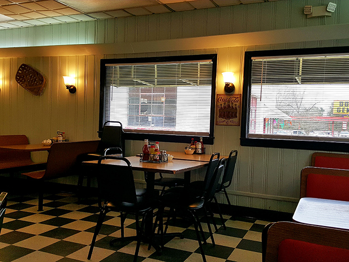 The diner's exterior on a cloudy day still beckons with the promise of warmth, comfort, and food that tastes like someone's grandma made it.