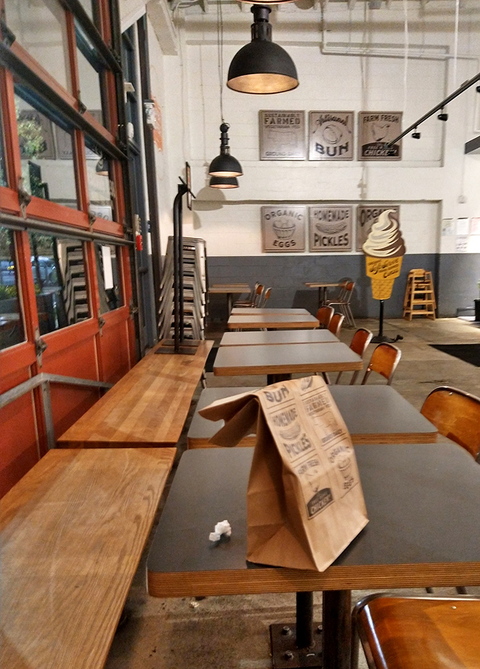 Wooden tables, industrial lighting, and vintage-inspired signage create an atmosphere that says, "Yes, we're hip, but we're more interested in your taste buds than Instagram."