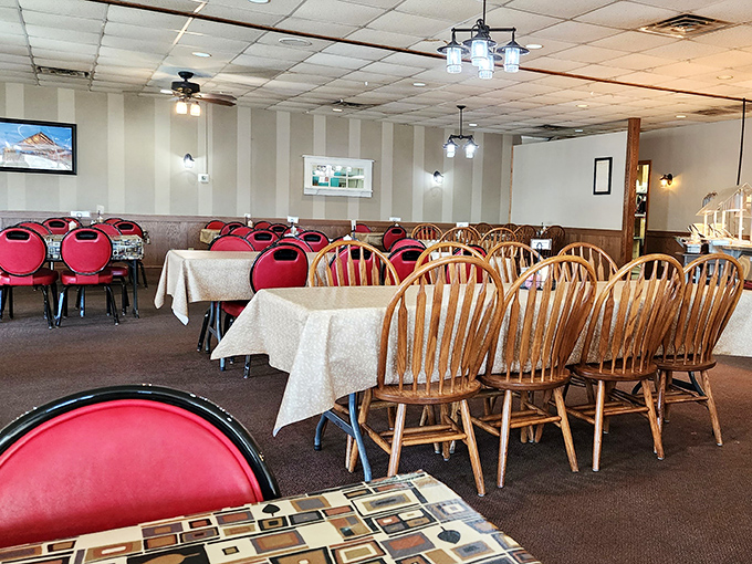 Red chairs and wooden tables create the perfect backdrop for memory-making meals. Simplicity never goes out of style.