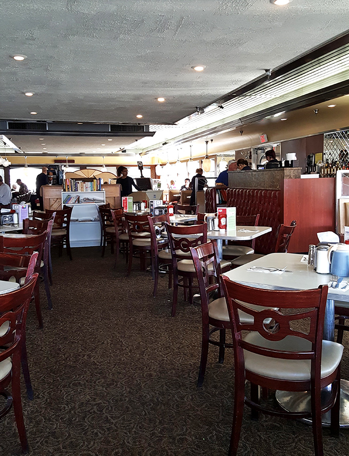 The dining room hums with conversation and silverware clinks&mdash;that soundtrack of American dining that no playlist could ever replicate.