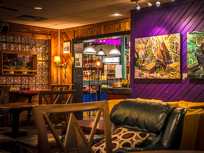 Purple walls and wooden accents create the perfect backdrop for both serious work sessions and those "just one more cup" conversations that stretch into hours.