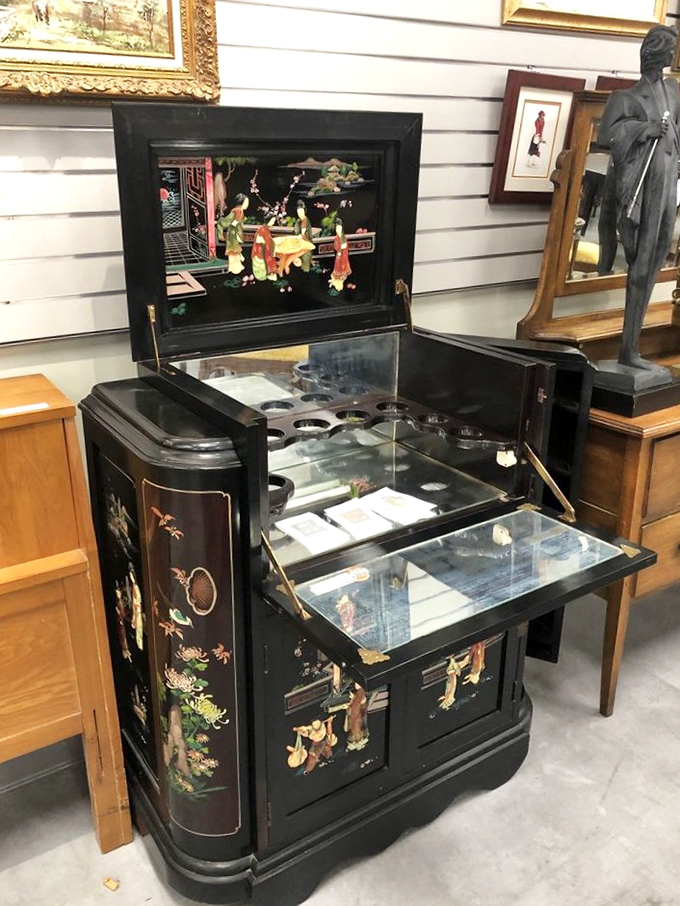 This isn't just an antique Chinese cabinet&mdash;it's functional art with hidden compartments for secrets or, more realistically, your remote controls.