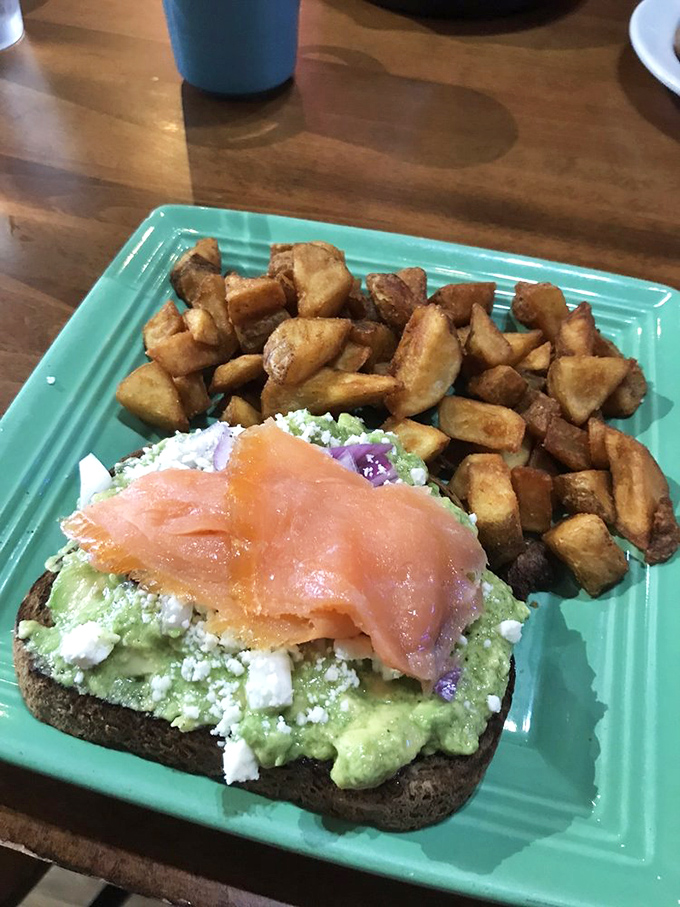 Breakfast potatoes that have achieved the golden-brown perfection we all aspire to, paired with avocado toast that Instagram dreams are made of.
