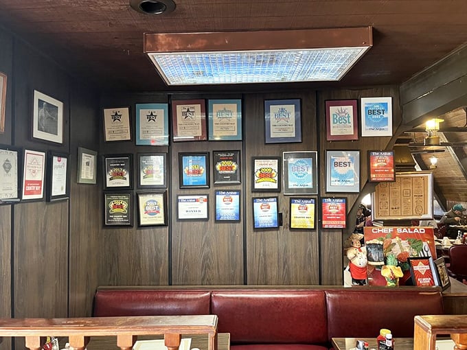 Wall of fame or wall of flavor? These awards aren't just decoration&mdash;they're documented evidence of breakfast crimes too delicious to prosecute.