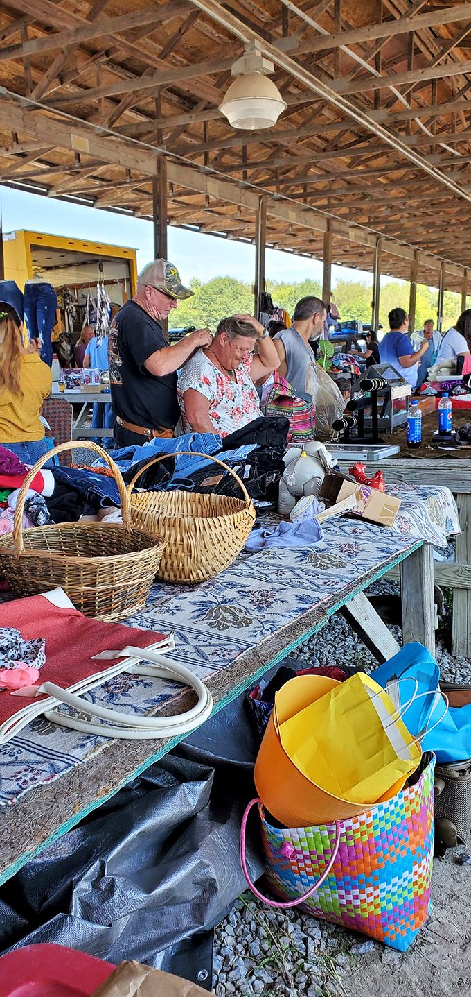 Shopping in progress! Vendors and customers engage in the timeless dance of browsing, considering, and perhaps a bit of friendly haggling.