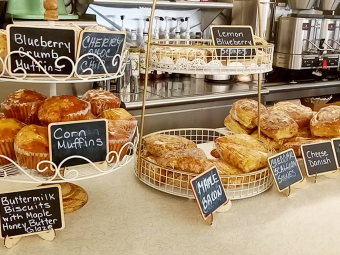 The pastry display&mdash;where good intentions about "just having coffee" go to die in the most delicious way possible.