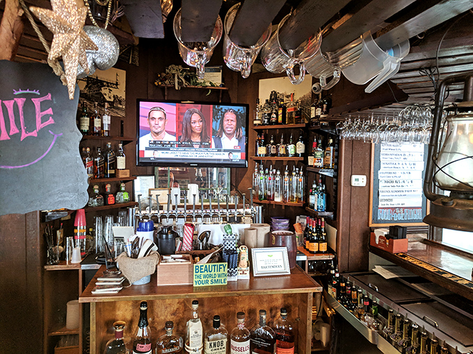 A bar that feels like it's been serving the perfect pint since prohibition ended. The hanging glassware catches light like crystal chandeliers in a working-class palace.