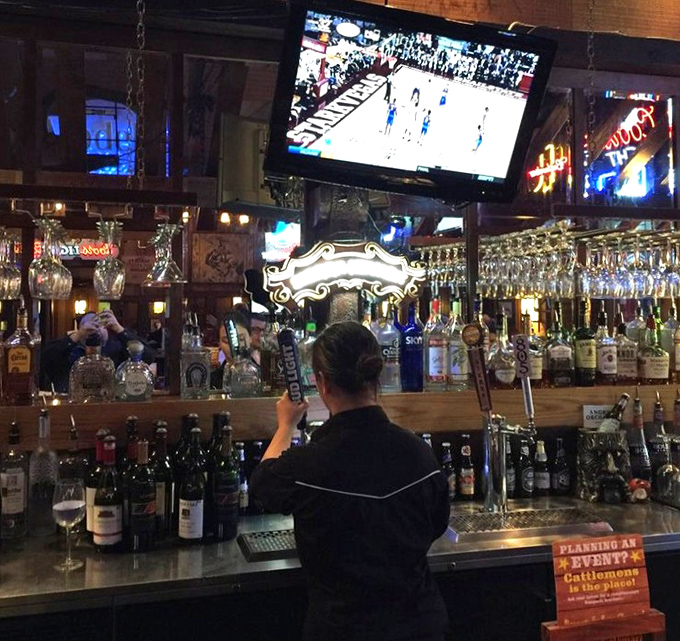 A bartender's domain stocked with enough spirits to complement every cut of meat on the menu.