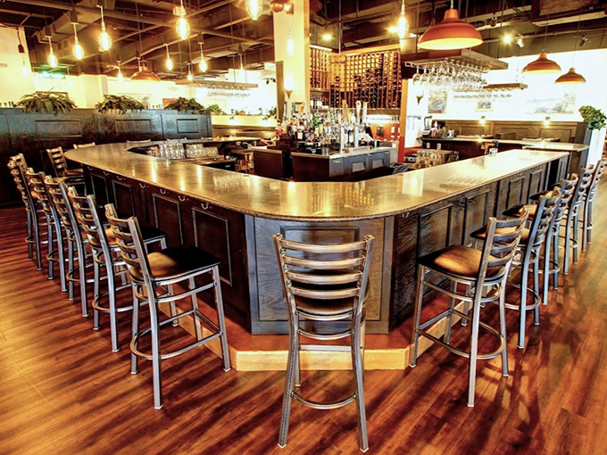 The inviting bar area offers the perfect spot for pre-dinner drinks or casual dining with friends.