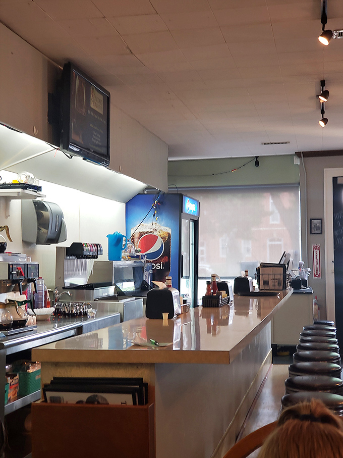 At this counter, coffee refills appear like magic and the banter between staff and regulars is as essential to the experience as the food itself.