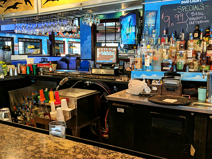 This isn't just a bar&mdash;it's command central where libations are crafted to complement the briny delights on your plate.