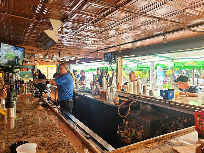 The bar area where cold drinks and warm hospitality create the perfect recipe for memorable afternoons.