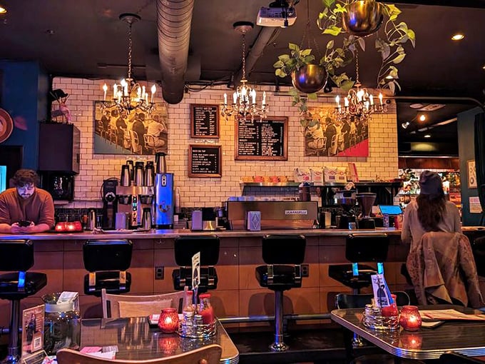 The bar area buzzes with possibility – part speakeasy, part living room, with chandeliers that somehow make drinking before noon seem perfectly reasonable.