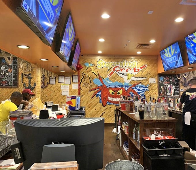 The bar area where cold beverages provide essential relief from the delicious heat of properly seasoned Cajun cuisine.