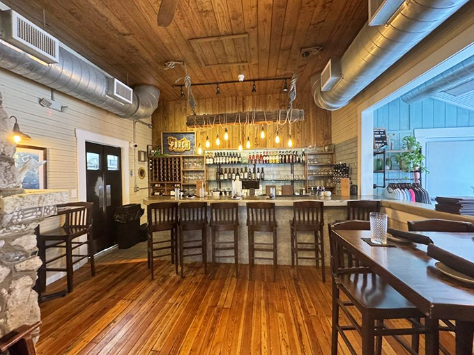 The bar area combines rustic charm with island casual&mdash;like if Hemingway designed a space for people who actually enjoy company. 