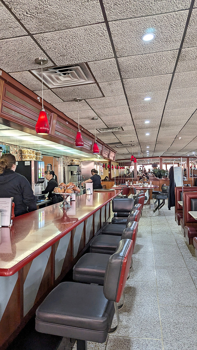 The counter seats: front-row tickets to the greatest show on earth&mdash;short-order cooks performing breakfast ballet.