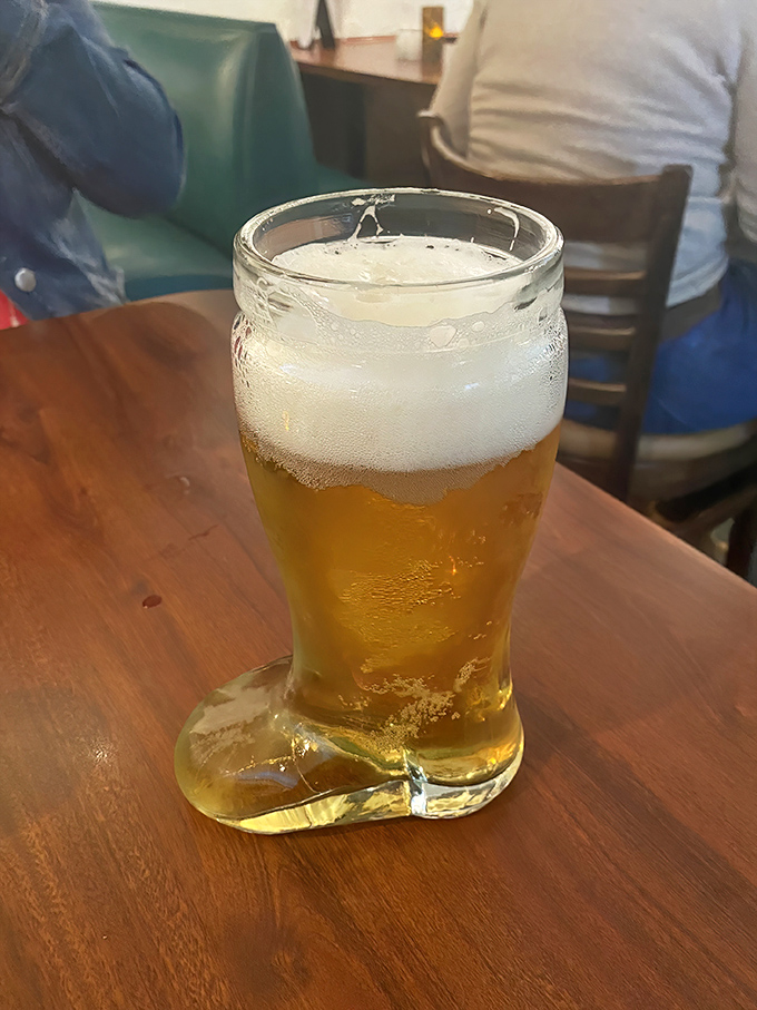 Not just a beer&mdash;a cultural experience in glass boot form. The condensation says "I'm cold," but the amber color whispers "I'm delicious."