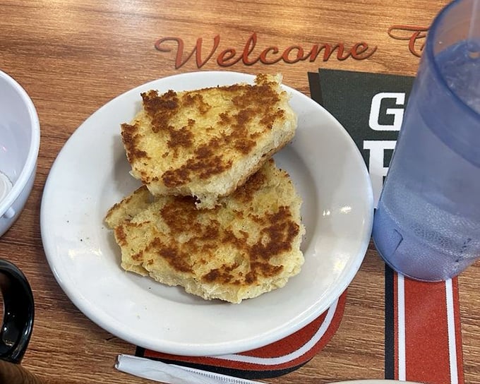 These aren't just griddled biscuits&mdash;they're golden discs of buttery perfection waiting to be the supporting actors in your breakfast drama.