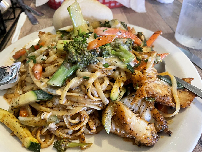 Blackened grouper linguine with fresh vegetables proves that seafood and pasta were meant for each other. Like a coastal romance novel on a plate.