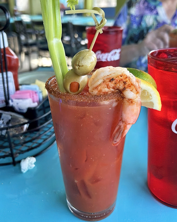 A proper Bloody Mary should double as an appetizer. This garnish-adorned beauty, complete with a shrimp perched on the rim, clearly understood the assignment.