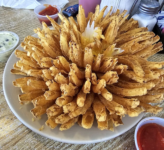 This bloomin' onion isn't just fried&mdash;it's an edible firework display of crispy petals that demands to be shared (but you won't want to).