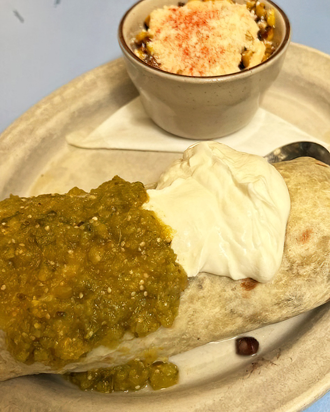 This burrito doesn't just satisfy hunger&mdash;it abolishes it, with green salsa and sour cream providing the perfect finishing touches.