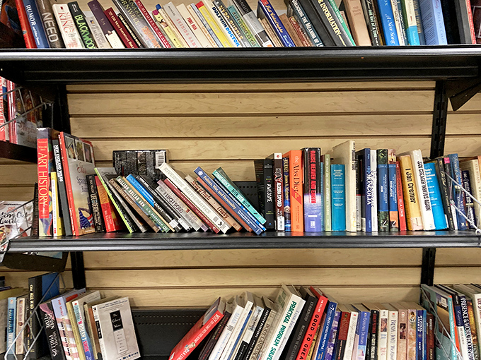 Books lean against each other like old friends at a reunion. Each spine a doorway to worlds both familiar and waiting to be discovered.