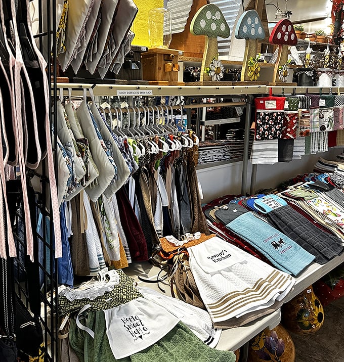 The boutique corner offers practical art for everyday life. These aren't just kitchen towels&mdash;they're conversation pieces with a sense of humor.