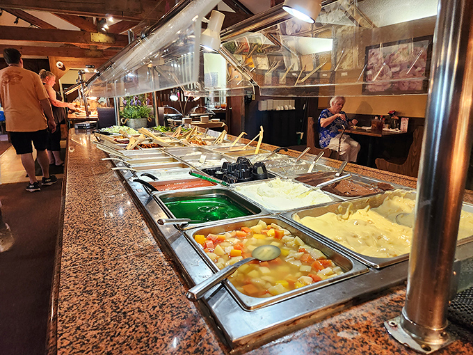 The buffet line stretches like a highway of homestyle delights. Each stop more tempting than the last.