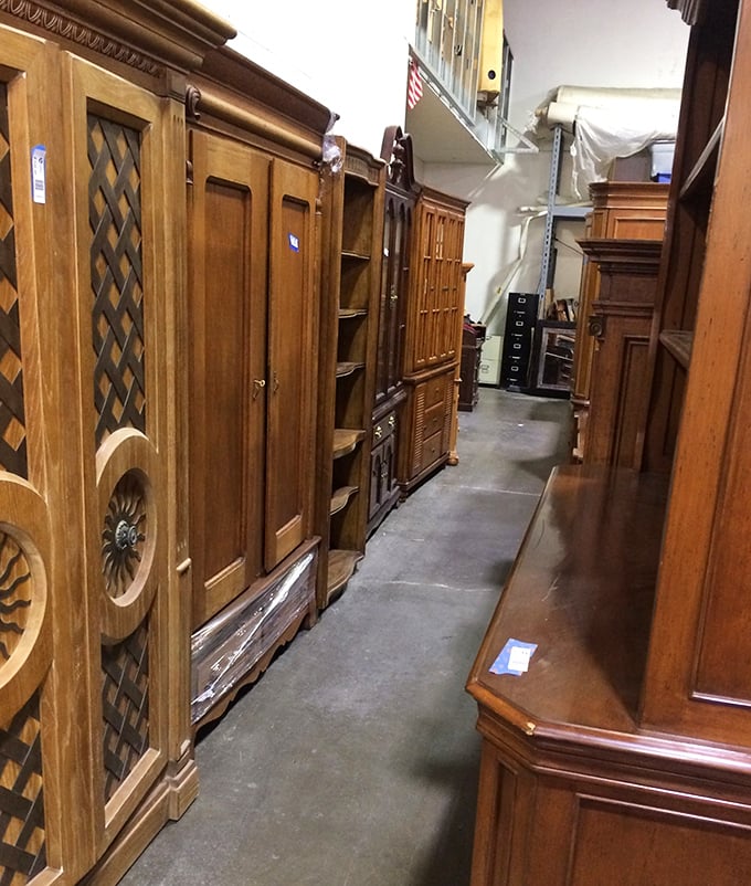 Wooden cabinet corridor showcasing craftsmanship from eras when furniture was built to last generations. These aren't just storage&mdash;they're time machines.
