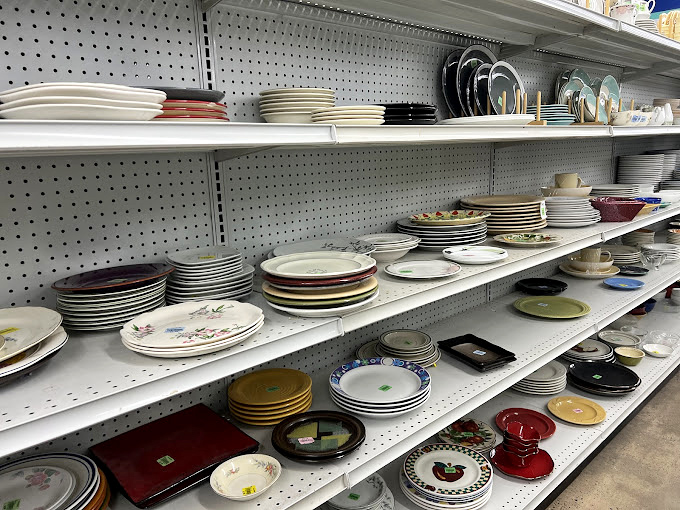 Plates stacked with more care than a Jenga tournament&mdash;each one a potential centerpiece for your next dinner party.