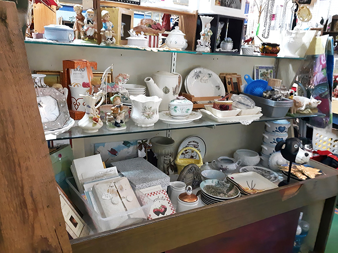 Grandma's china cabinet exploded into this booth of vintage ceramics. Those teacups have probably served more gossip than Earl Grey.