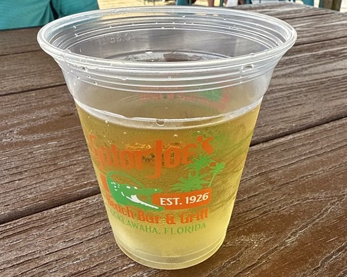 Sunshine in a cup. The branded glassware holds liquid refreshment perfect for washing down those famous gator bites on a hot Florida afternoon.