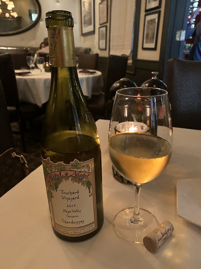 A glass of Nickel & Nickel Chardonnay awaits its moment to shine alongside your steak &ndash; the beginning of a perfect gastronomic friendship. 