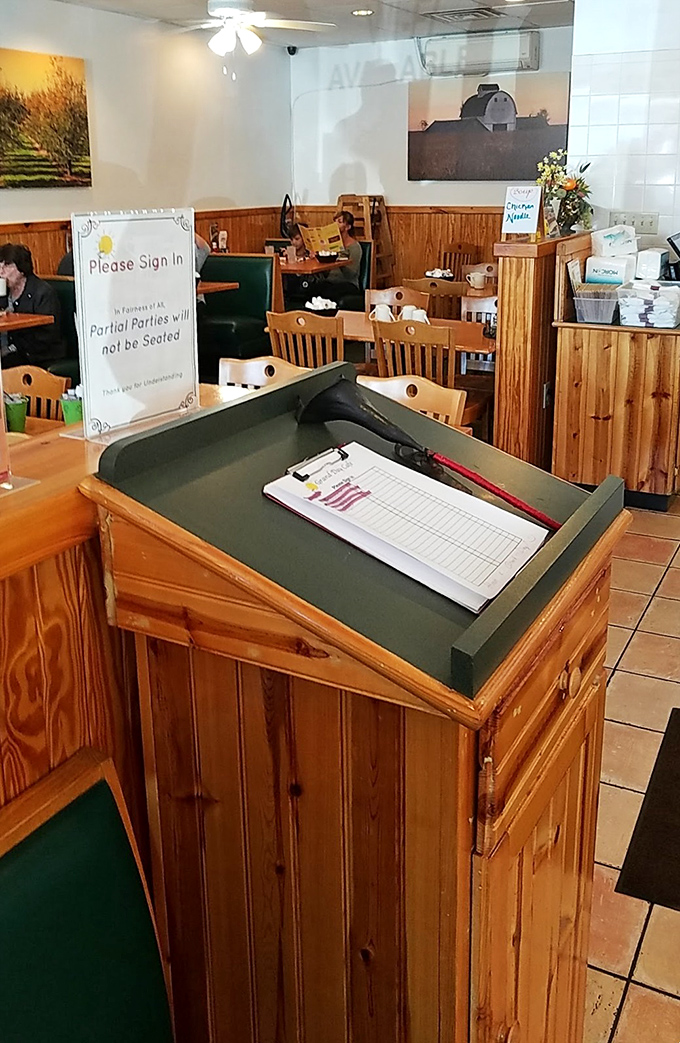 The humble check-in station, where breakfast dreams begin their journey from order pad to perfectly plated reality.