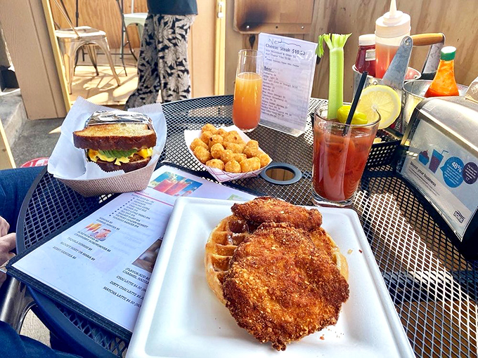 A marriage of flavors so perfect it deserves its own romantic comedy &ndash; crispy golden chicken embracing a fluffy waffle in breakfast harmony.