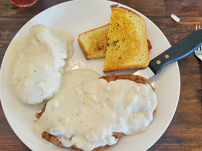 Country gravy isn't just a topping&mdash;it's a commitment, a lifestyle choice, and on this chicken fried steak, it's absolutely non-negotiable.