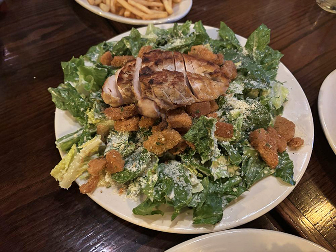 A Caesar salad that Julius himself would approve &ndash; crisp romaine, grilled chicken, and shavings of parmesan creating a battlefield of flavors.