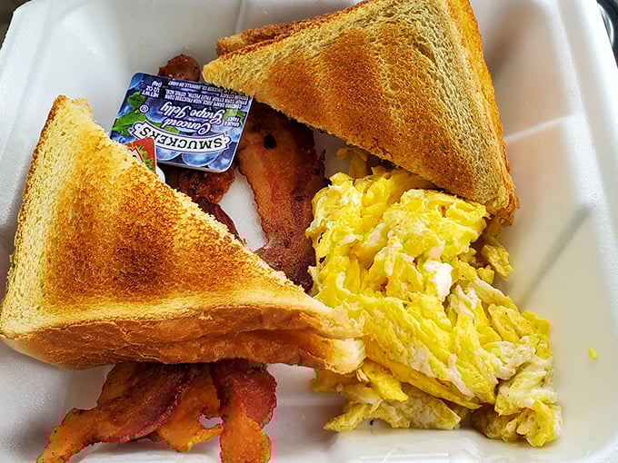 Breakfast perfection doesn't need fancy plating &ndash; just perfectly scrambled eggs, crispy bacon, and toast that's actually toasted properly.