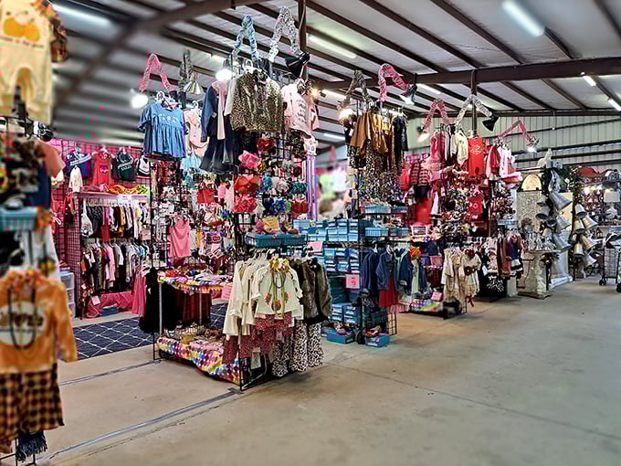 Children's clothing heaven! This meticulously organized booth transforms shopping for kids' outfits from chore to delight with its rainbow of options.