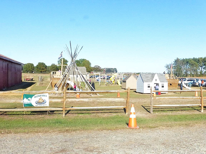 Family fun takes center stage at Coleman's seasonal attractions. That teepee structure hints at fall festivals and harvest celebrations ahead.