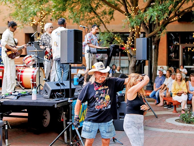 Live music in intimate outdoor settings creates the perfect atmosphere for making new friends. No binoculars needed to see the stage here!