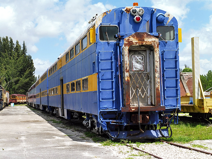 The blue and yellow commuter car #8726 stands as a fading reminder of when Americans commuted in style rather than in traffic.