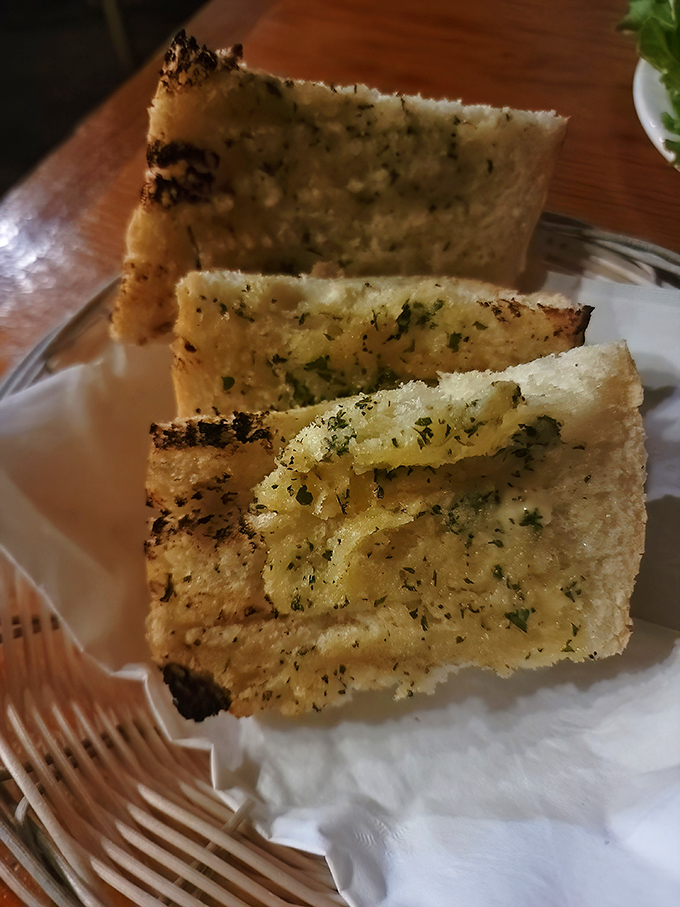 Garlic bread that doesn't whisper its presence&mdash;it announces itself with buttery, herbaceous authority. Social distancing from vampires has never been more delicious.