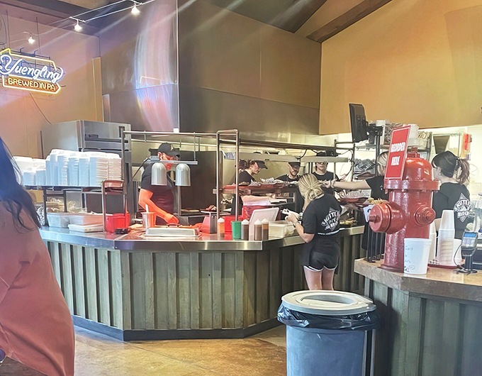 Behind-the-scenes magic where smoke meets meat. Like watching artists at work, except the canvas is edible and the medium is fire.