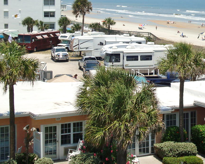 Palm trees frame this beachside RV park, where temporary residents enjoy permanent views at a fraction of resort prices.