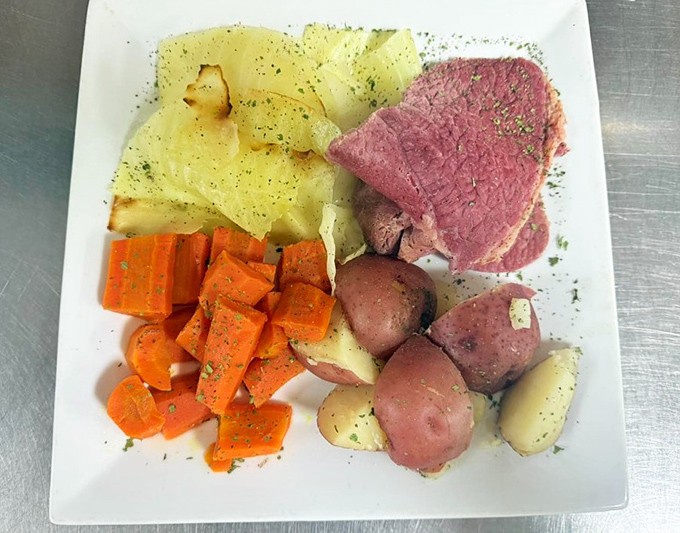 Corned beef dinner with potatoes and carrots&mdash;comfort food that whispers "everything's going to be okay" with each tender, savory bite.