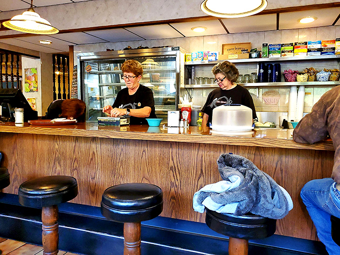 Counter seating: where solo diners become part of the family and watching short-order magic becomes part of the meal.