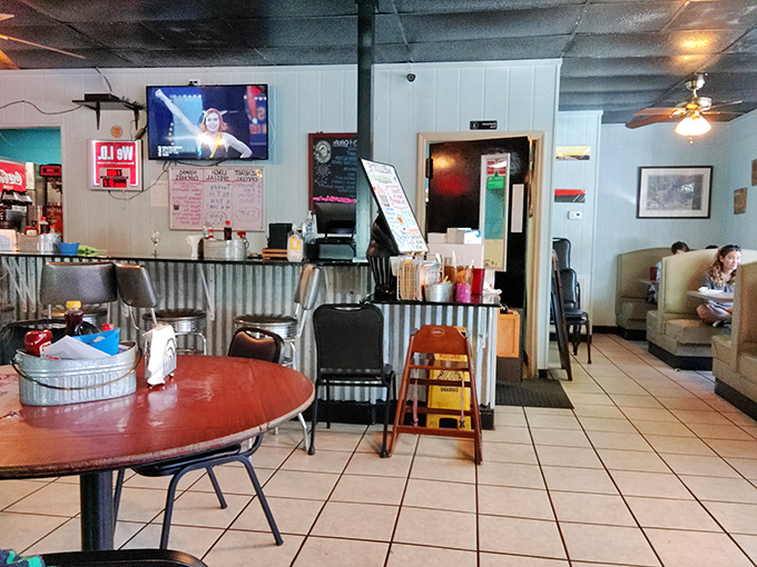 The counter where magic happens &ndash; where coffee cups are never empty and the staff remembers how you like your eggs without asking.